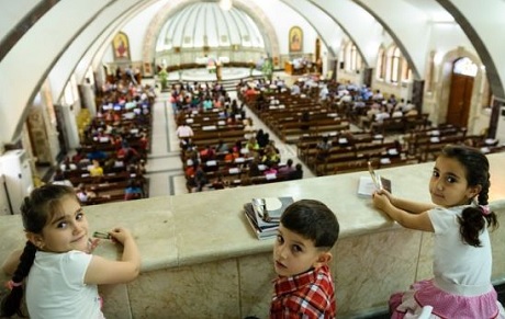Iraq Christians flee as Islamic State takes Qaraqosh